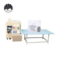 China Automatic Rolling Coiling Quilt Rolling Wrapping Machine for sale