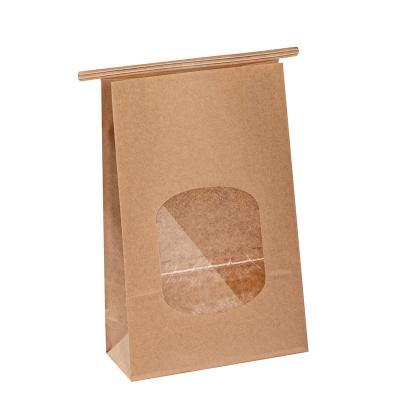 China Custom Kraft Paper Bags with Clear Window 8 Color Waterbased Ink Printing for sale