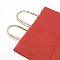 China 100-150gsm Kraft Paper T Shirt Bags Compostable Recyclable 10kg Capacity for sale