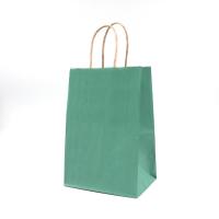 China Custom Kraft Paper T-Shirt Bags with Handles CMYK Pantone Printing 30x40cm for sale