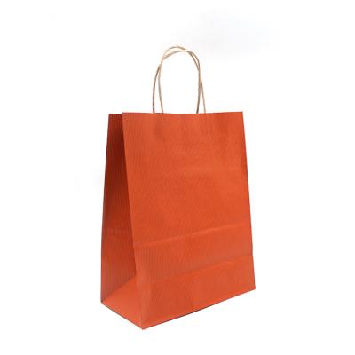 China Recycled Kraft Paper Shopping Bags with Handles OEM Custom Logo Printing 100gsm for sale