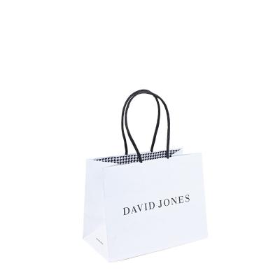 China Brown White Kraft Paper Bag with Paper Twist Rope Handles 100-150gsm for sale