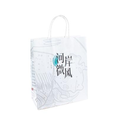 China Custom Kraft Paper Gift Bags with Handles 11 lb Capacity OEM Logo Printing for sale