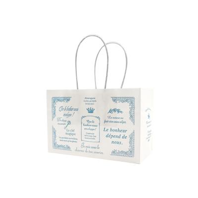 China Customized Kraft Paper Packaging Bags Uncoated Lining With Handle for sale