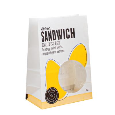 China OEM Kraft Paper Packing Bags 8 Color Printing Oil Resistance Inside Finishing for sale