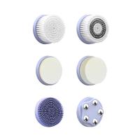 China IPX6 6in1 Vibrating Face Brush 1000mAh Rechargeable Face Brush Purple for sale