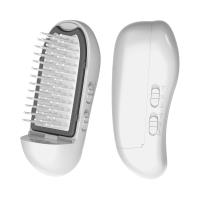 China 450mAh Battery IONIC Hair Brush Vibration Blue Light Hair Brush for sale
