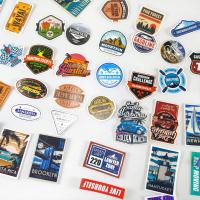 China Custom Vinyl Die-Cut PVC Stickers Waterproof Printing 1-12 Colors Transparent Adhesive Logo Labels for sale