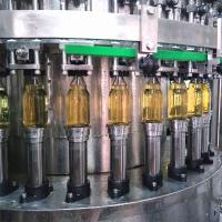 China SGS Certified 10000BPH Glass Bottle Juice Filling Machine automatic tree in one bottle capper machine for sale