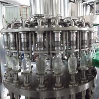 China SGS Certified 10000BPH Glass Bottle Juice Filling Machine automatic tree in one bottle capper machine for sale