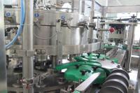 China Automated 12000BPH 640ml Beer Bottle Filling Machine three in one monobloc glass bottle filling for sale