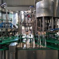 China 18000BPH Automatic Bottle Ginger Ale Carbonated Drink Filling Machine DCGF32-32-10 for sale