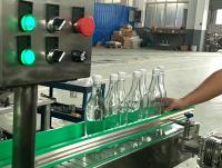 China Beverage Screw Capping Machine 2000bph Glass Bottle Sealing Machine for sale