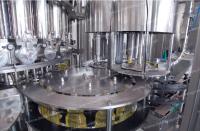 China Plastic PET Bottle SS304 Automatic Oil Filling Machine 18000bph for sale