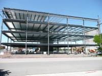 China Durable Steel Frame Commercial Building with PVC Rain Spout - 200 TON Minimum Order, 45 Day Delivery for sale