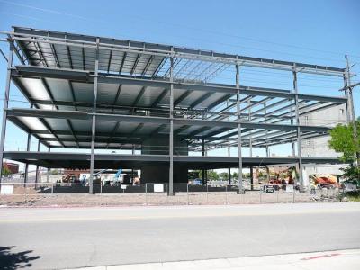 China Durable Steel Frame Commercial Building with PVC Rain Spout - 200 TON Minimum Order, 45 Day Delivery for sale