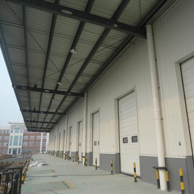 China Custom Steel Structure Workshop Building GB Standard 50-100m Span With Various Window Options for sale