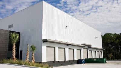 China Custom Steel Frame Prefabricated Industrial Building with Metal Wall Cladding - Q355/Q235 Steel, 30-45 Day Delivery, ISO/CE Certified for sale