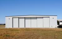 China Custom Height Q355B Q235B Steel Structure Prefab Aircraft Hangar with Sliding Doors - 30-50m Span Capacity for sale