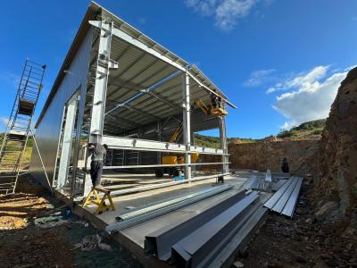 China 150mm Thickness Steel Structure Warehouse Produced Using Tekla Drawing Providing Long Lasting Industrial Storage Solutions for sale