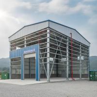 China Fire Protection System Optional Steel Structure Warehouse Featuring Round Bar Brace and Double Slope Roof for Durable Storage Buildings for sale