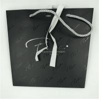 China Custom Kraft Paper Gift Bags with Foil Stamping 157-250 GSM for Jewelry Packaging for sale