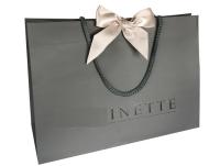 China Custom Jewelry Paper Bags 230gsm Dust Proof Portable Shopping Bags with Logo for sale