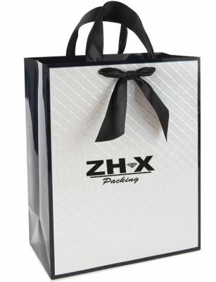 China PP Handle White Jewelry Paper Bag Foil Stamping 200g Art Paper Custom Size for sale