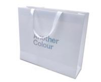 China Custom Kraft Paper Shopping Bags with CMYK Offset Printing C1S C2S 1000pcs MOQ for sale