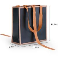 China Custom Gold Foil Hot Stamp Coated Paper Jewelry Bag with Silk Ribbon 1000pcs MOQ for sale