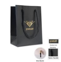 China Custom Gold Hot Stamping 350gsm Paper Gift Bag with Nylon Handle for Jewelry for sale