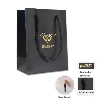 China Custom Gold Hot Stamping 350gsm Paper Gift Bag with Nylon Handle for Jewelry for sale