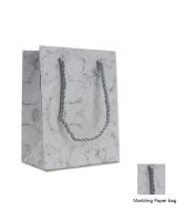 China Custom Gold Hot Stamping 350gsm Paper Gift Bag with Nylon Handle for Jewelry for sale