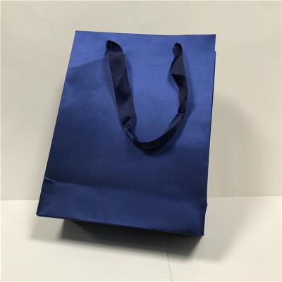 China Custom Satin Surface Paper Jewellery Gift Bags with Silk Ribbon Handle 100pcs MOQ for sale