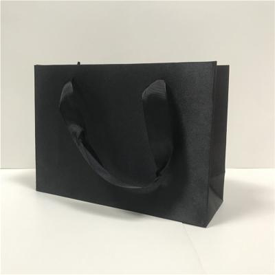 China Custom Matte Texture Jewelry Paper Gift Bags with PP Nylon Handle 100pcs MOQ for sale