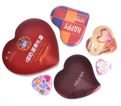China Heart Shape Gift Tin Box Packaging Glossy Printing Embossed Logo for sale
