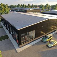 China Quick Install Prefabricated Budget Steel Warehouse Structures Metal Warehousing Solutions for sale
