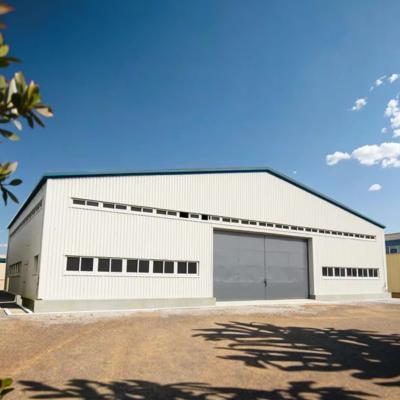 China Clear Span Design Warehouse Steel Structure Weld Metal Buildings Workshop ISO Approved for sale