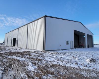 China ASTM Standard Commercial Metal Storage Building With PU Insulation Option for sale