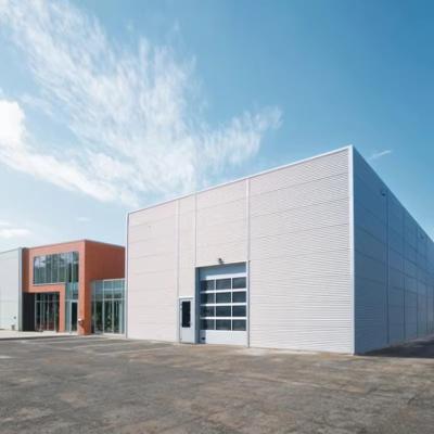 China Sandwich Panel Wall Prefab Steel Warehouse Long Span Grid Structure Quick Assembled for sale