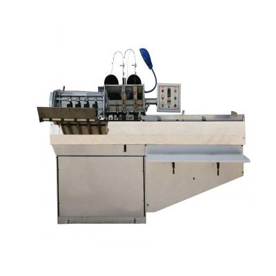 China DQB404-02GD Many Heads Semi-automatic Saddle Stitching Binding Folding Machine for sale