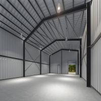 China Prefab Warehouse Steel Structure with Light Steel Frame and Water-proof Performance for sale