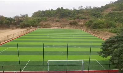 China 60mm Height Football Artificial Turf  6600 Detex Wear Resistant for sale