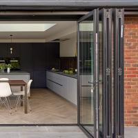 China Large Modern Aluminum Folding Door Sound Proof Double Glazed Folding Door for sale
