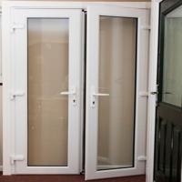 China Modern Residential PVC Glass Entry Door Vinyl Casement French Doors Cutomized for sale