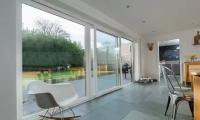 China Exterior PVC Sliding Door Double Tempered Glass Patio Balcony Sliding Glass Doors for sale
