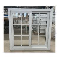 China PVC UPVC Double Pane Glass White Vinyl Sliding Window With Grill Mosquito Mesh for sale