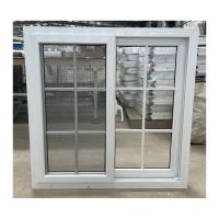 China PVC UPVC Double Pane Glass White Vinyl Sliding Window With Grill Mosquito Mesh for sale