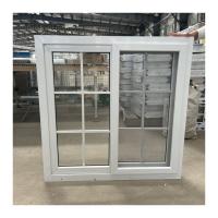 China PVC UPVC Double Pane Glass White Vinyl Sliding Window With Grill Mosquito Mesh for sale