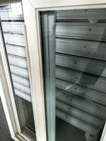 China Security Mesh UPVC Sliding Window For Residential Home Replacement for sale